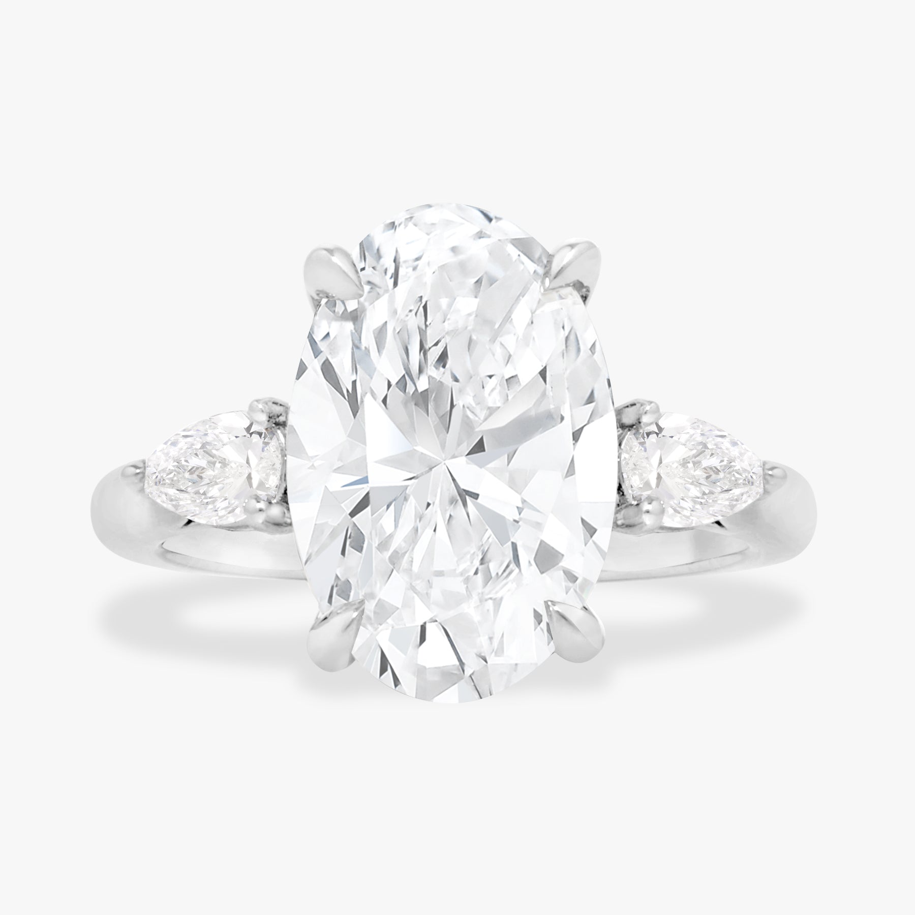 3.51ct Lab Grown Oval Diamond in a Three Stone Pear Setting – RWFJ